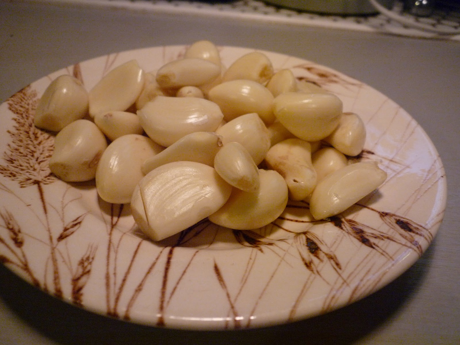 SALAD DAYS, OFFAL NIGHTS: Spicy braised fish with whole garlic (da suan ...