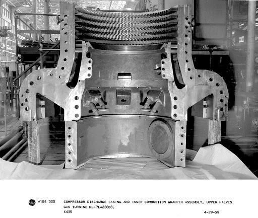 Compressor discharge casing and inner combustion wrapper assembly ...