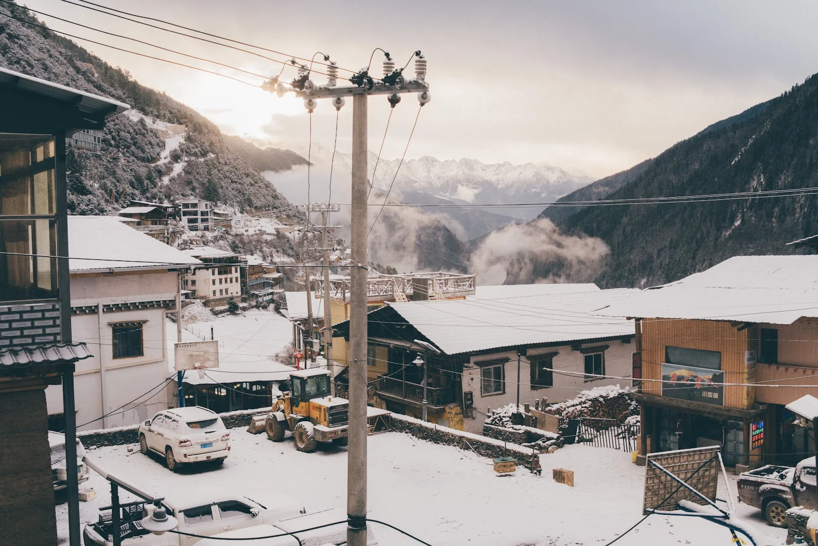 Snowy Mountain Village Utility Scene 5K Desktop Wallpaper