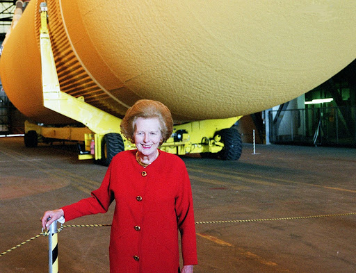 An optical illusion places Lady Margaret Thatcher under an external ...