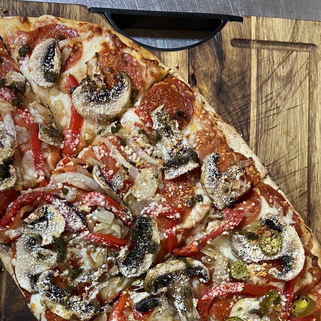 Henry’s Pizza - HOME OF THE FAMOUS FLAME GRILLED PIZZA! Call now for ...